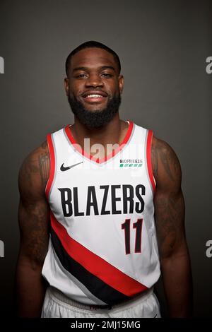 Portland Trail Blazers forward Keljin Blevins (21) and Denver Nuggets ...
