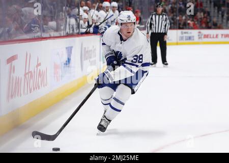 Toronto Maple Leafs defenseman Rasmus Sandin (38) shoots against the ...