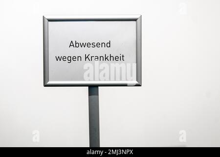 Sign Absent due to illness Stock Photo - Alamy