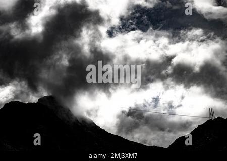 Cable car to Piz Murtel with dramatic clouds, St Moritz, Engadin ...