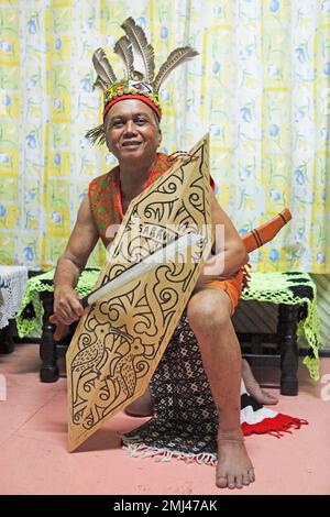 Iban man in traditional dress at the Sarawak Cultural Village, Damai ...