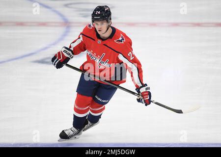 Washington Capitals forward Connor McMichael controls the puck during ...