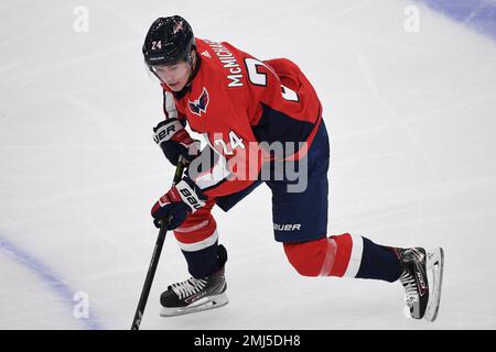 Washington Capitals forward Connor McMichael controls the puck during ...