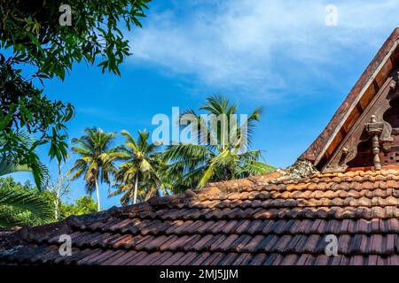 Carving wood gable roof on a resort hotel in India, Alappuzha, Kerala ...