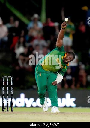 South Africa's bowler Sisanda Magala, right, celebrates after bowling ...