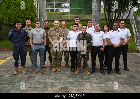 Airmen, Soldiers and civilians from El Salvador and the New Hampshire National Guard listen to a ...