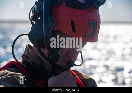 A US Naval Aircewman (Helicopter), assigned to the Chief of Naval ...