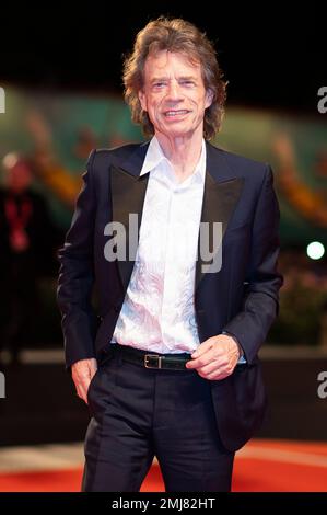 Actor Mick Jagger poses for photographers upon arrival at the premiere ...