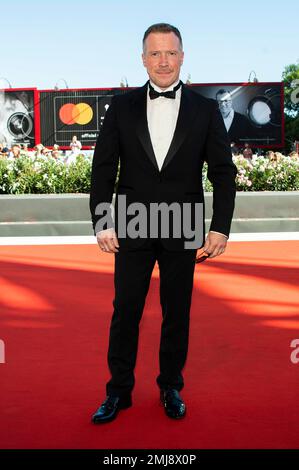 Actor Aleksei Kravchenko poses for photographers at the photo call for ...