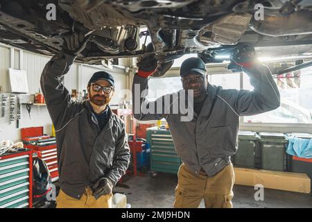 Car repair on a lift for the repair of the chassis, automatic ...