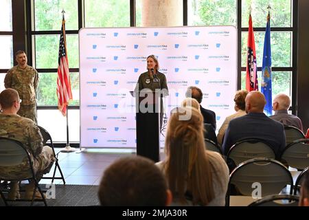 Colonel Angela Ochoa, 19th Airlift Wing and installation commander, cut ...