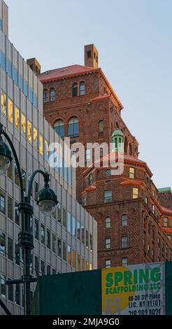 The rich polychrome masonry, red tile and copper-topped cupolas of NH ...