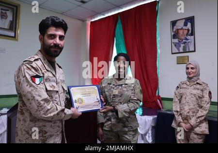 Kuwait Army doctor, Lt. Col. Hussain Al-Saraf, is accompanied by Area ...