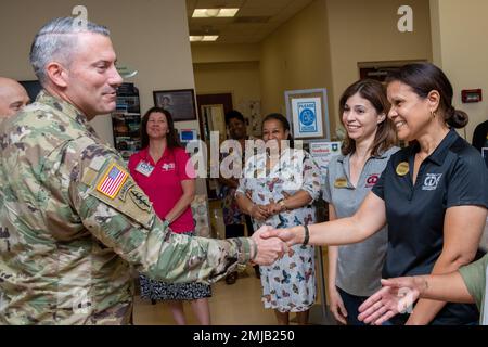 Col. Travis Mills, 502nd Force Support Group commander, speaks at the ...