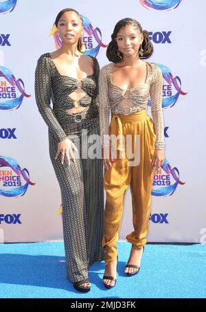 Chloe Bailey, left, and Halle Bailey arrive at the BET Awards at the ...
