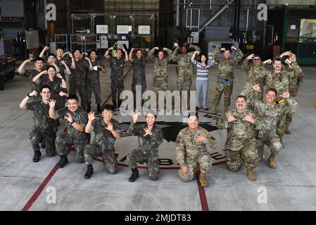 8th Maintenance Group Airmen pose for a photo during the 8th MXG's ...