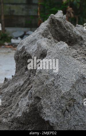 portrait of gray sand dunes as a raw material for building (walls ...