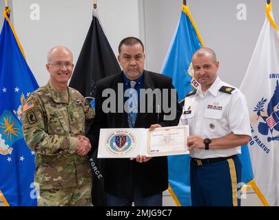 LTG Ronald J. Place, DHA Director, and SGM Isaac A. Bray, present the ...