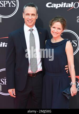 President of ESPN inc. James Pitaro, left, and Jean Louisa Kelly arrive ...