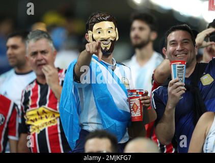 An Argentina wears a Lionel Messi mask prior to the FIFA World Cup ...