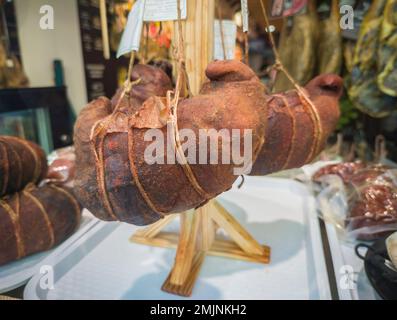 Extremaduran buche displayed at butchers shop. Pork stomach stuffed ...