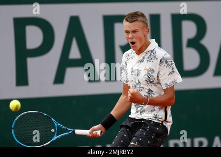 Toby Kodat of the U.S. clenches his fist after scoring a point against ...