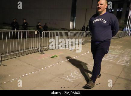 Riot police remain on guard during the demonstration. While the 21st ...