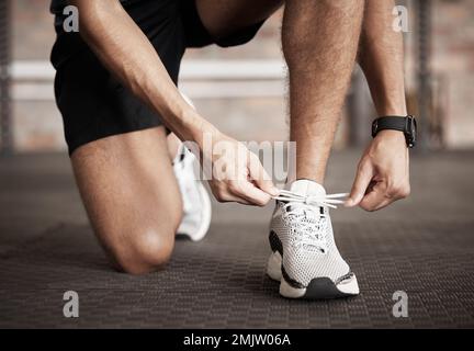 Lace, gym or hands of person with shoes at gym for training, exercise ...
