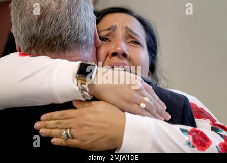 Tanya Ibar, the defendant's wife hugs his sister Melissa Brown and his ...