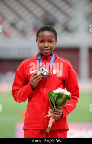 Bahrain's Winfred Mutile Yavi celebrates as she wins gold in the women ...