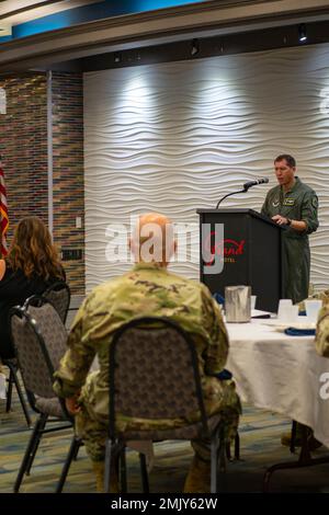 Col. Daniel Hoadley, 5th Bomb Wing commander (right) and members of the ...
