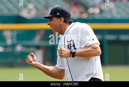 Actor Lou Ferrigno reacts after throwing out a ceremonial first pitch ...