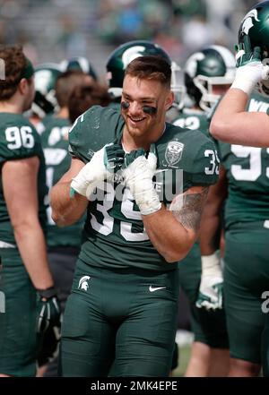 Michigan State linebacker Joe Bachie runs a drill at the NFL football ...