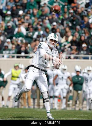Michigan State quarterback Theo Day throws during an NCAA college football practice, Monday, Aug ...