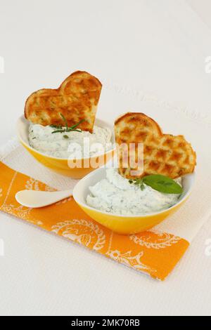 South German cuisine, waffles with herb curd in small bowls, heart ...