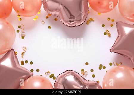 Frame made of heart-shaped balloons on pink background. Valentine's Day ...