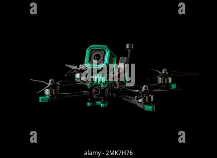 Modern FPV drone. Four-engine aircraft on the radio control. Drone for ...