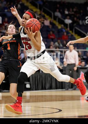 Oregon State's Aleah Goodman drives next to Stanford's Anna Wilson ...