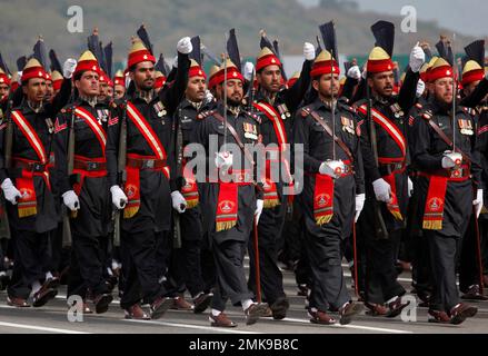 Pakistani paramilitary troops march during a military parade to mark ...