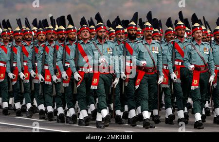 Pakistani paramilitary troops march during a military parade to mark ...