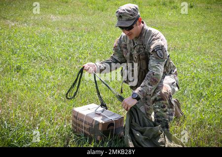 A U.S. Army Soldier collects his assigned box of Meals-Ready-to-Eat ...