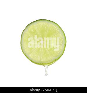 Slice of lime with dripping essential oil isolated on white Stock Photo ...