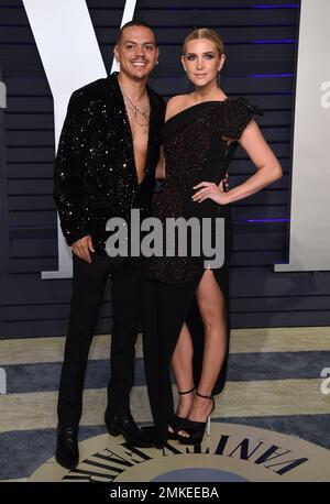 Evan Ross, left and Ashlee Simpson arrive at a red carpet event for ...