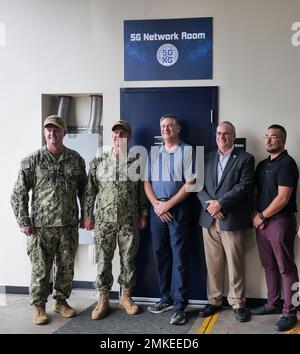 Guests gather for a group photo with Rear. Adm. Bradley Rosen,Commander ...