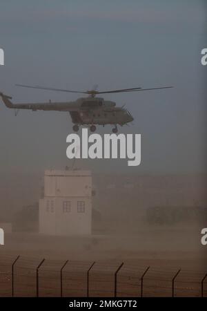 An Indian Air Force (IAF) commando demonstrates slithering skills as ...