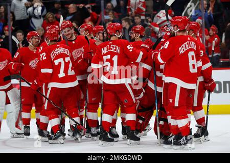 Detroit Red Wings players celebrate after beating the Carolina ...