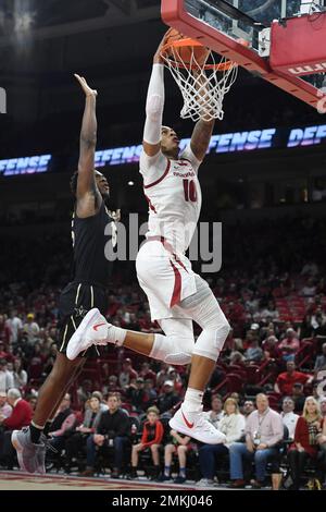 Arkansas forward Daniel Gafford dunks during practice at the NCAA men's ...