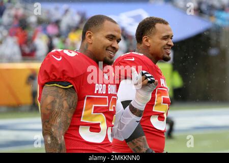The AFC's Maurkice Pouncey, right, and Mike Pouncey, left, are ...