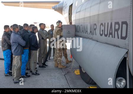 Members of 120th Airlift Wing Maintenance Squadron use a de-icing boom ...