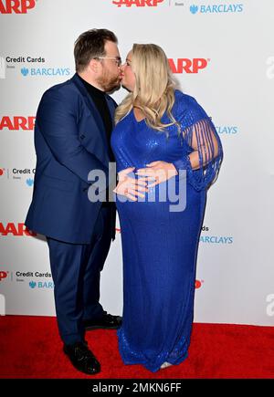 Paul Walter Hauser and his wife Amy pose together at the premiere of ...
